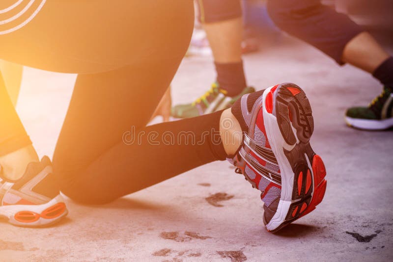 Runners Preparing on the Floor. Stock Photo - Image of activity ...