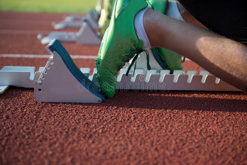 Runners Preparing for Race at Starting Blocks Stock Photo - Image of ...