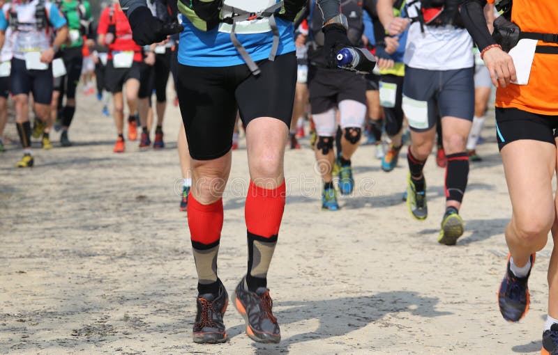 Runners racing on the road stock photo. Image of line - 51529366