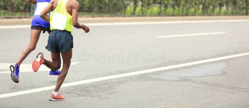 Runners Running on City Road Stock Photo - Image of challenge, clothes ...