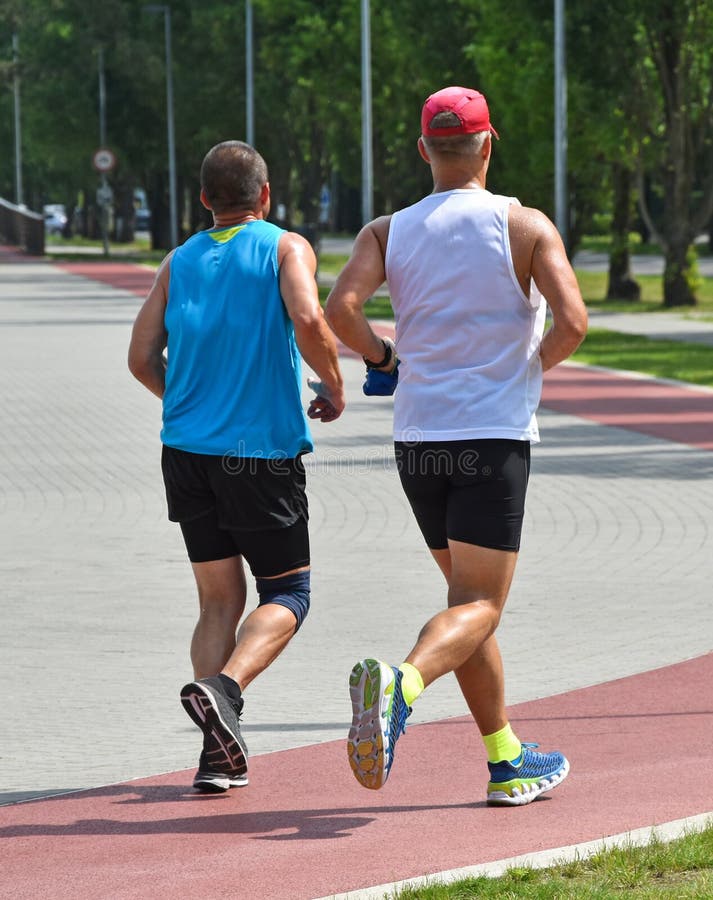 Runners on the Running Track Editorial Stock Photo - Image of amateur ...