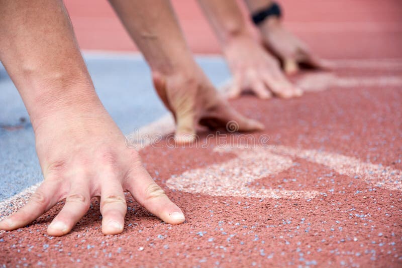 Runners at the Start of the Running Track Stock Photo - Image of ...