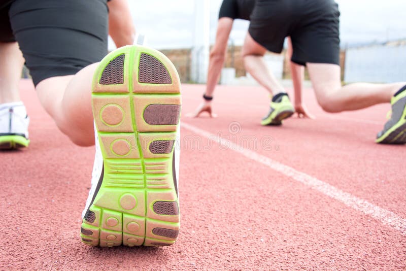 Runners at the Start of the Running Track Stock Image - Image of motion ...