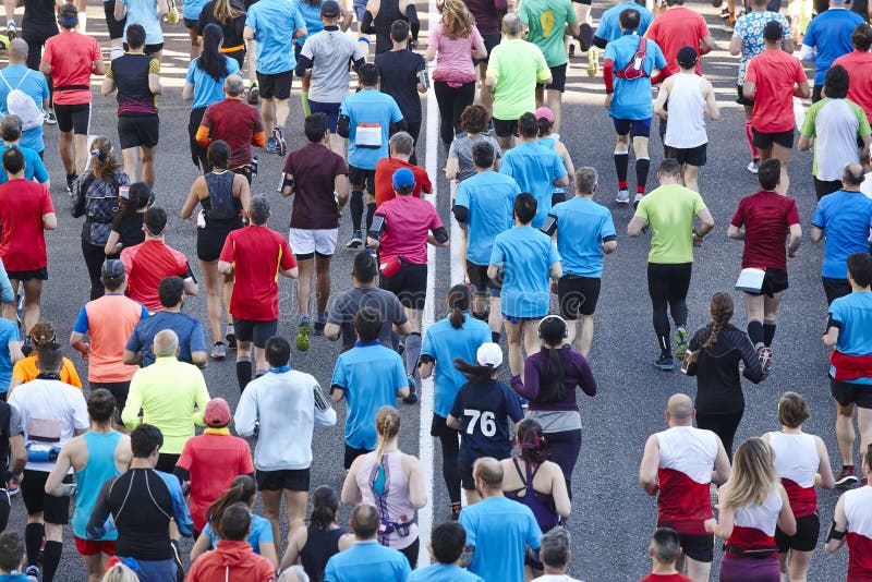 Runners on the Street. Athletes in Motion. Urban Competition. Crowd ...
