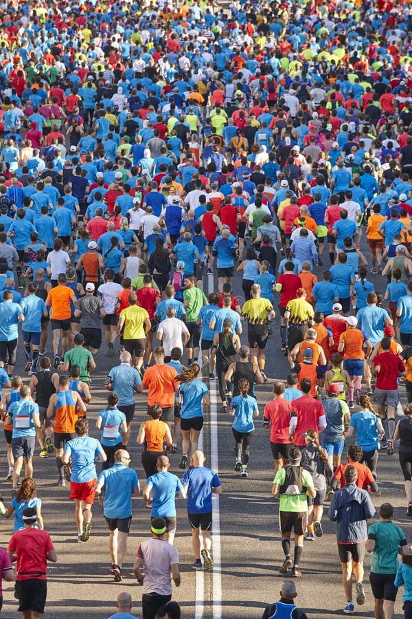 Runners on the Street. Athletes in Motion. Urban Competition. Crowd ...