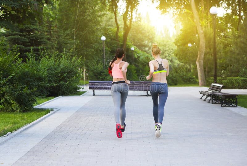 Runners Training Outdoors Working Out in the Park Stock Image - Image ...