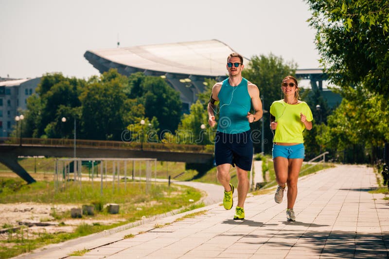 Runners Training Outdoors Working Out Stock Photo - Image of nature ...