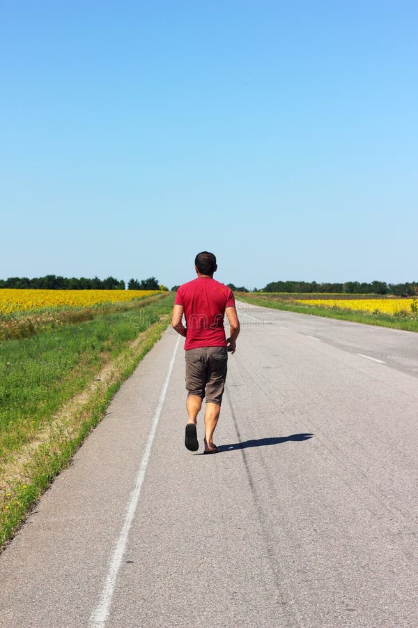 Running Along the Road into the Distance Stock Image - Image of runs ...