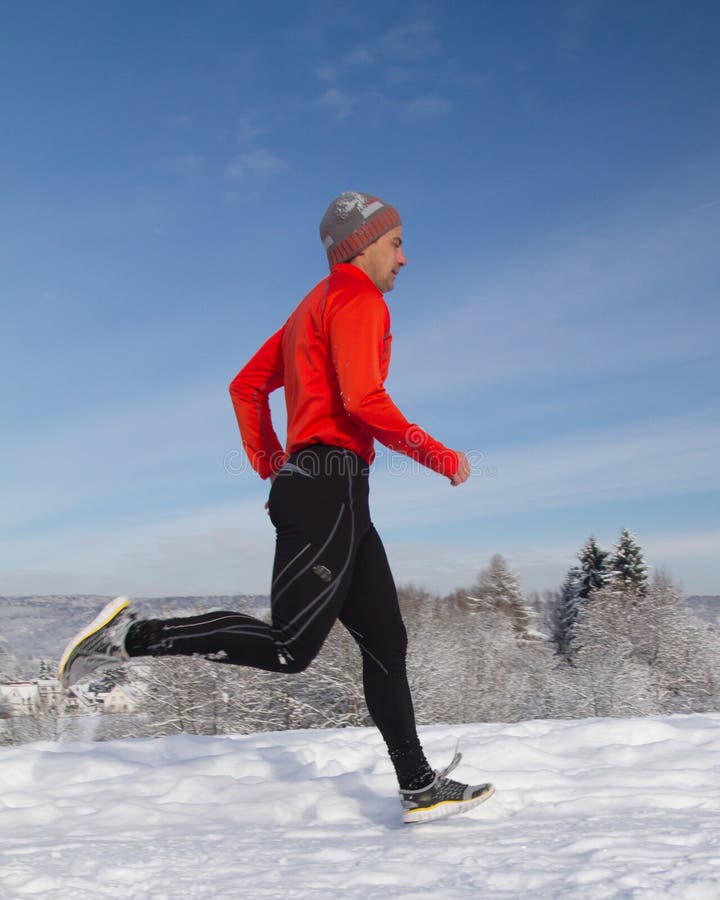 Running Athlete in the Snow Stock Image - Image of sportsman, runner ...