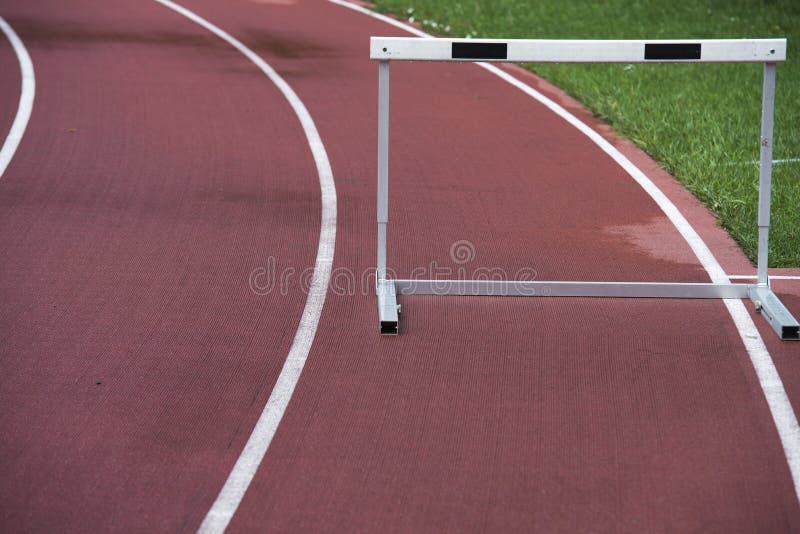 Running Athletic Track with Hurdle, Bad Weather, Wet Stock Photo ...
