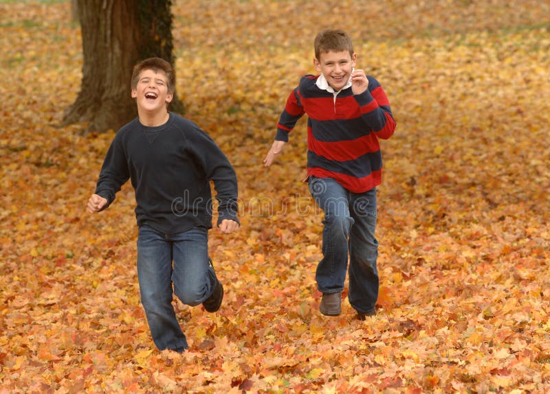 Running boys stock photo. Image of fall, autumn, children - 11599806