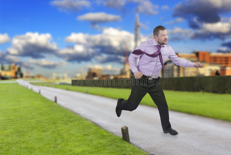 Running Businessman in a Hurry with Modern City in Stock Photo - Image ...