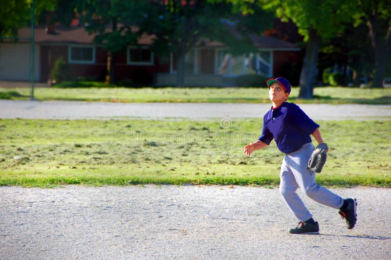 Running for the catch stock image. Image of littleleague - 2525481