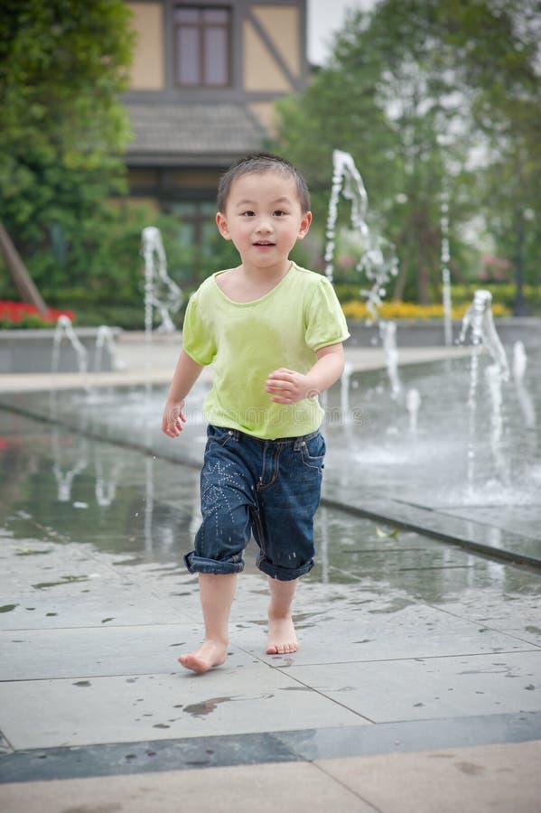 Running chinese boy stock photo. Image of asian, leisure - 14446358