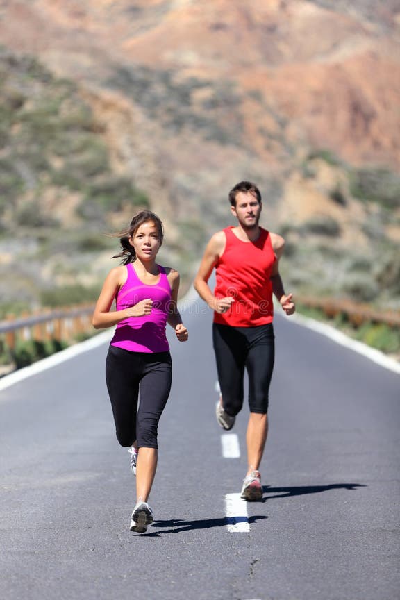 Running couple stock image. Image of activity, multiracial - 22030085