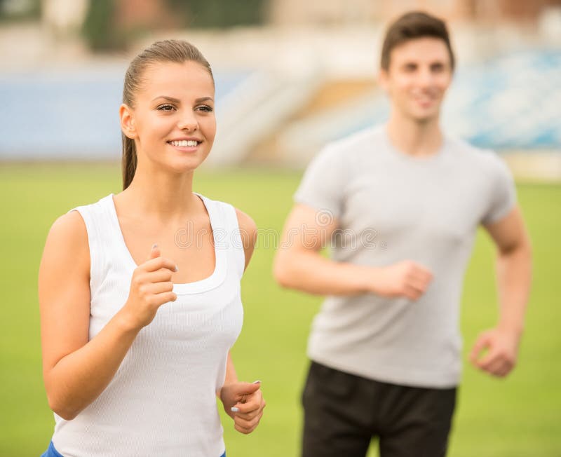 Running couple stock photo. Image of coach, beautiful - 59785926