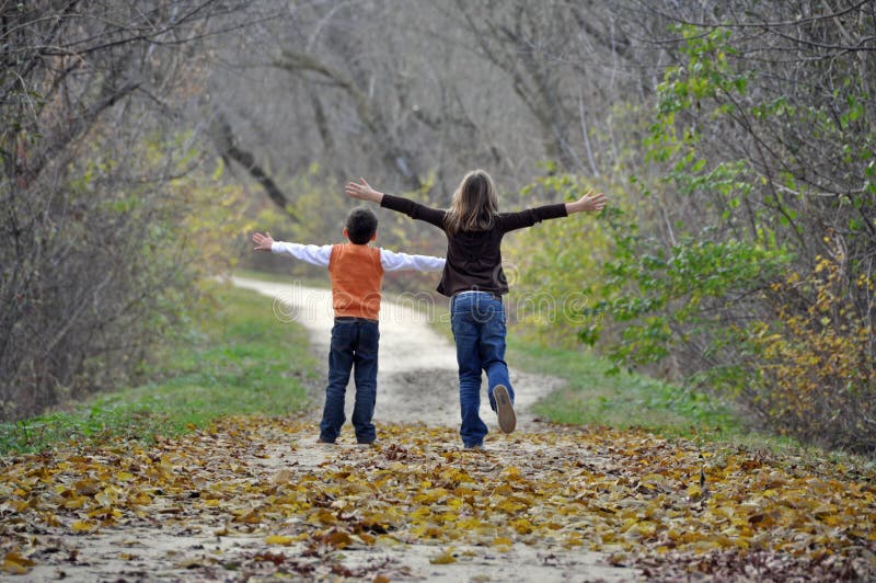 Running in fall stock photo. Image of sister, children - 11795612