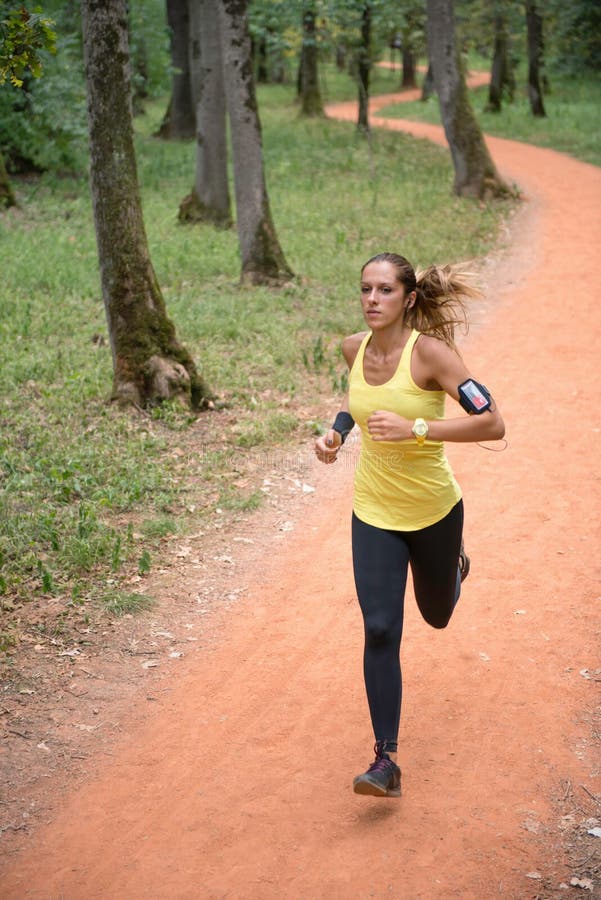 Running in forest stock photo. Image of young, flexibility - 223783698