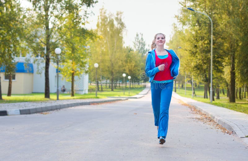 Running girl stock photo. Image of street, race, asphalt - 11453522
