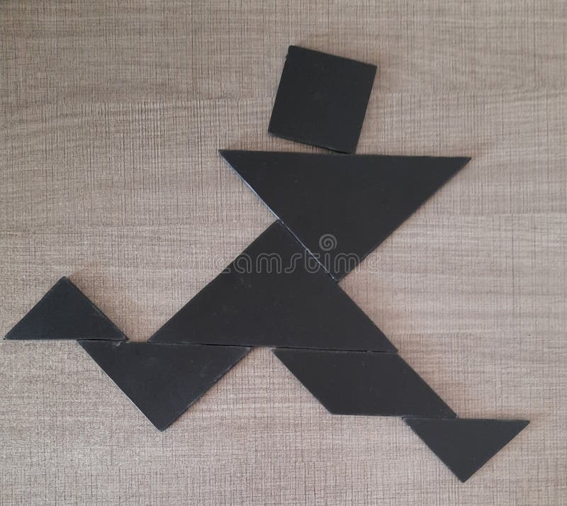 A Running Human Figure in the Form of a Tangram Puzzle Stock Photo ...