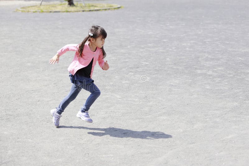 Running Japanese girl stock photo. Image of playground - 181919912