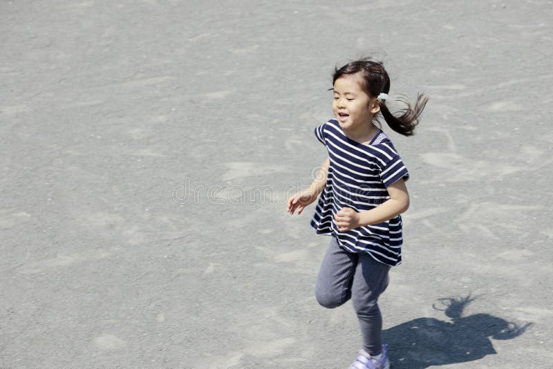 Running Japanese girl stock image. Image of blue, clear - 181918177