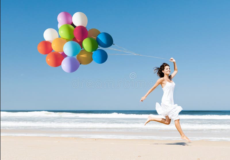 Jumping with balloons stock photo. Image of athletic - 19709624