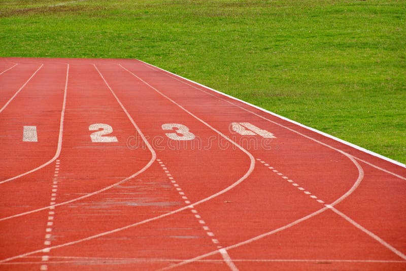 Running Lane with Grass Field Stock Image - Image of flag, light: 26266047