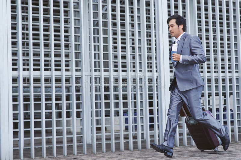 Running late for flight stock photo. Image of luggage - 59915162