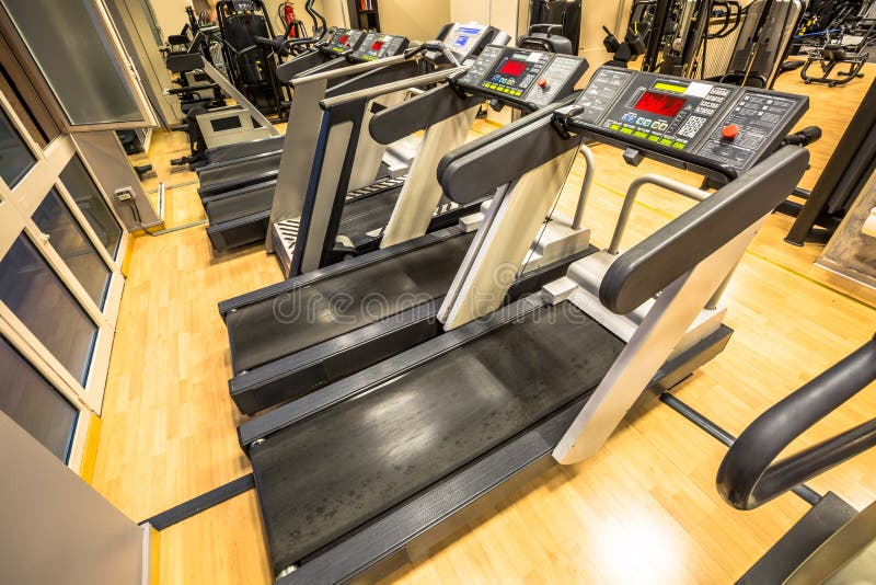 Running Machines stock photo. Image of exercising, health - 45605834