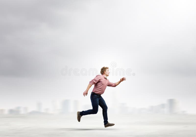 Running man stock photo. Image of jeans, cheerful, rush - 46856664