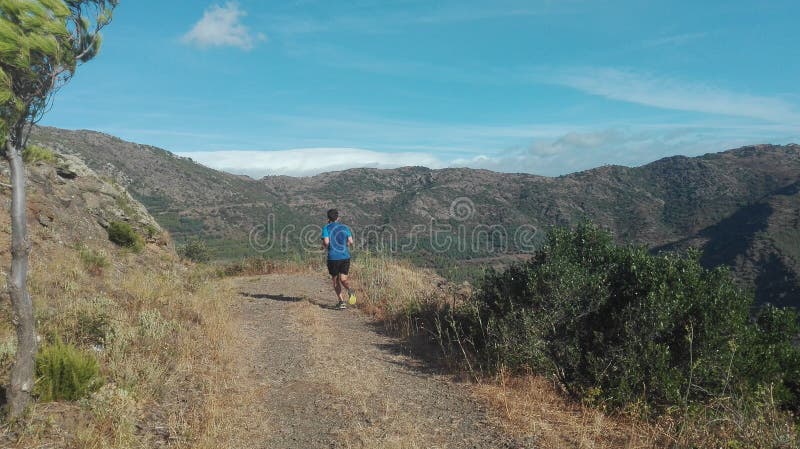 Running through the Mountains Stock Photo - Image of clouds, mountains ...