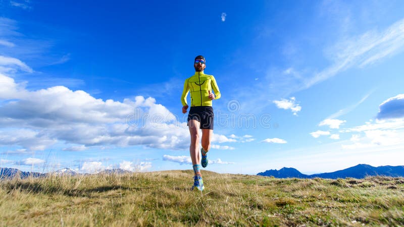 Running in the mountains stock photo. Image of nordic - 198820260