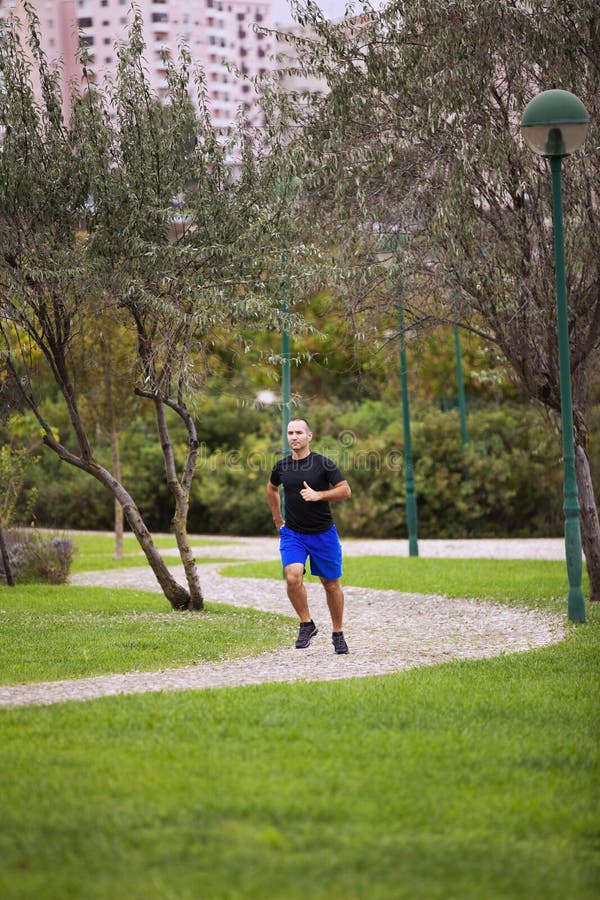 Running at the park stock image. Image of exercise, leisure - 35609985