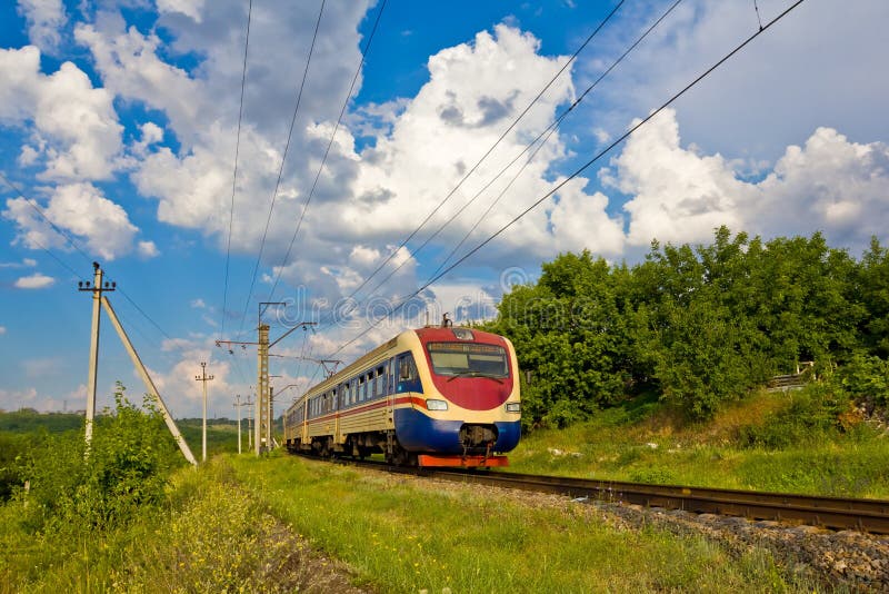 Running passenger train stock photo. Image of bright - 25461870