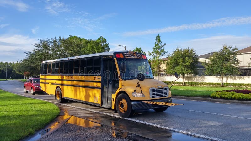A running school bus editorial photo. Image of elementary - 75872381
