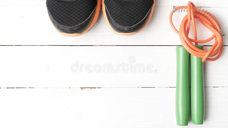 Running Shoes and Jumping Rope Stock Photo - Image of jump, white: 63201212
