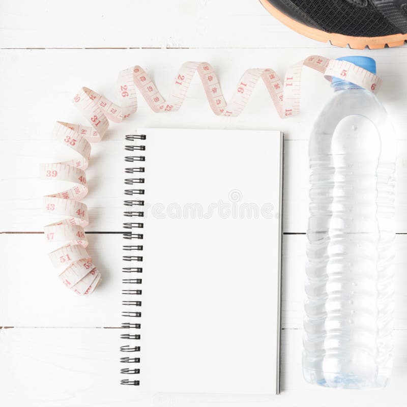 Running Shoes,measuring Tape,drinking Water and Notebook Stock Image ...