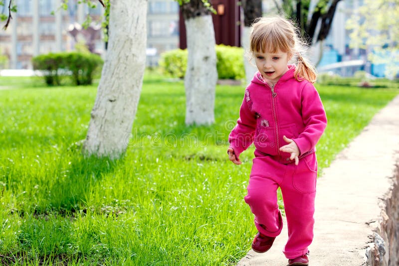Running small girl stock image. Image of outdoors, runway - 30783671