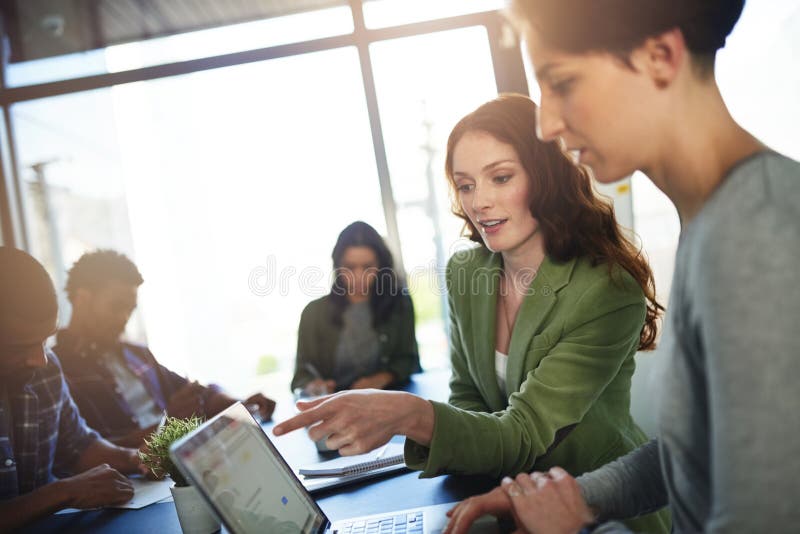 Running through Some Fine Details. a Group of Colleagues Working in an ...