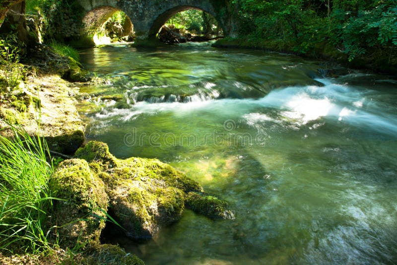 A Running Stream and a Bridge Stock Photo - Image of daglan, green ...