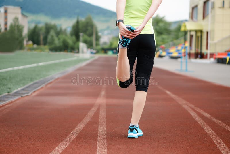 Running Stretching Runner Doing Warm-up before the Marathon. Stock ...
