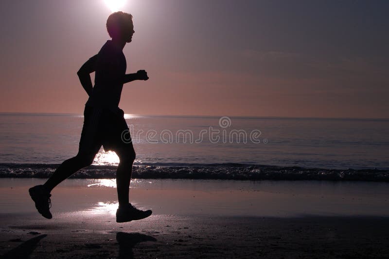 Running at Sunset stock image. Image of sand, profile - 4796393