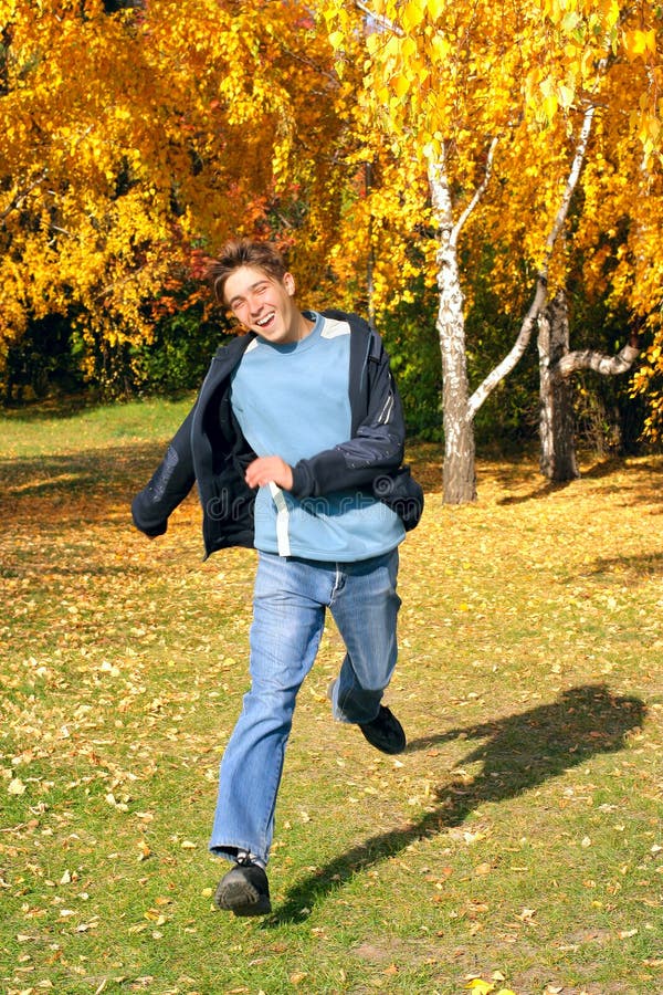 Running teenager stock image. Image of cute, jeans, expressing - 10498927