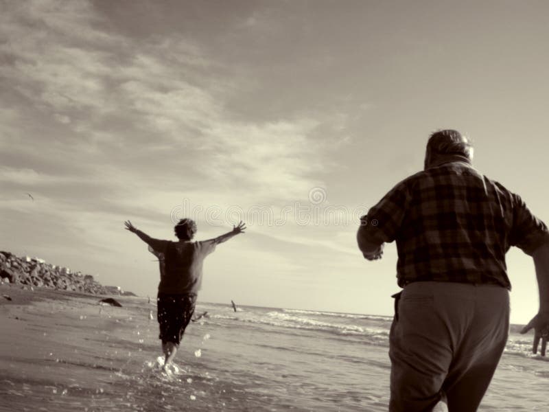 Running on the Beach Together Stock Photo - Image of energy, fidelity ...