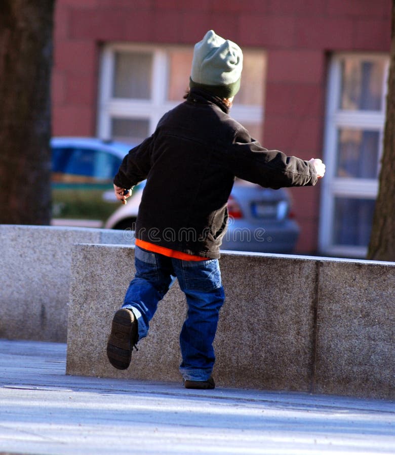 Running to his daddy stock photo. Image of back, preprimary - 2140786