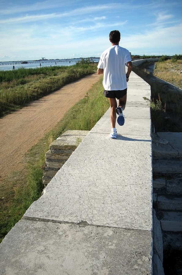 Running on the top stock photo. Image of health, unidentifiable - 6735996