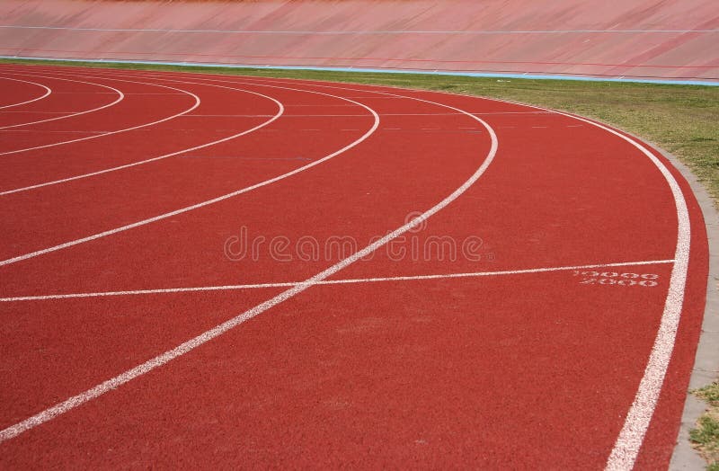 Red Track and Field lanes stock image. Image of compete - 51516367