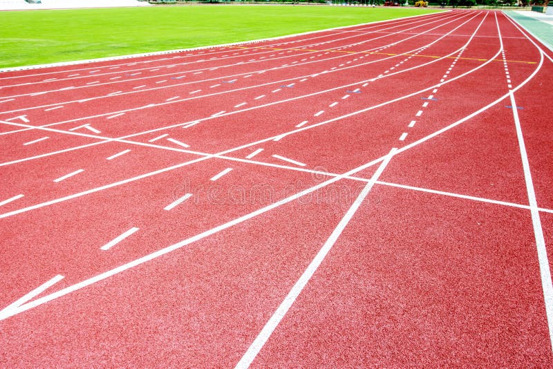 Running Track and Green Grass Stock Image - Image of racetrack, pattern ...