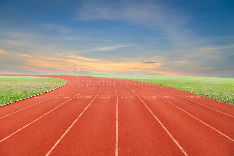 Running Track with Green Grass and Blue Sky White Cloud Backgro Stock ...